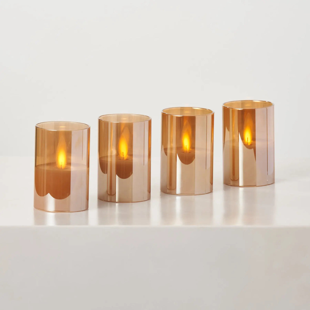 Rechargeable Amber Glass Flameless Votives - LED Set of 4 – Darby Creek ...