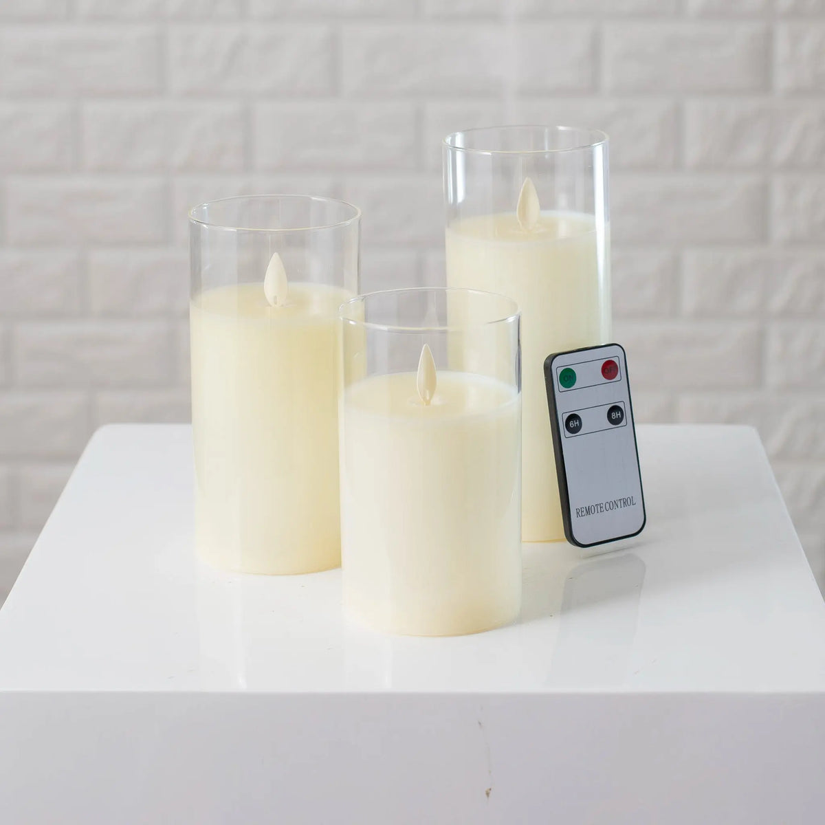 Moving Flameless LED Glass & Cream Pillar Candles with Remote - Set of ...